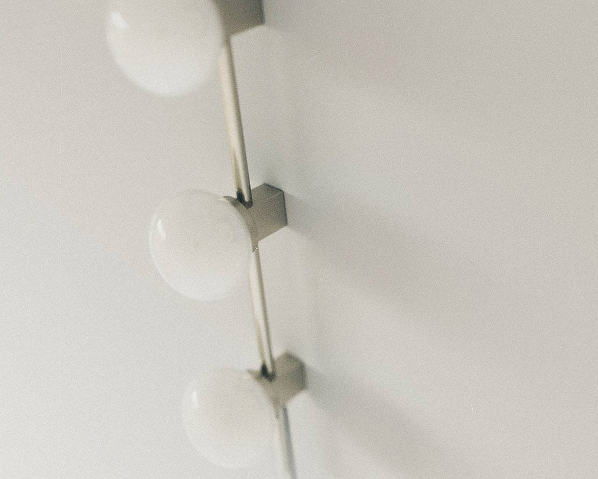 Ovoid Wall Lamp | Stainless Steel | Hand-Blown Glass | FRAMA