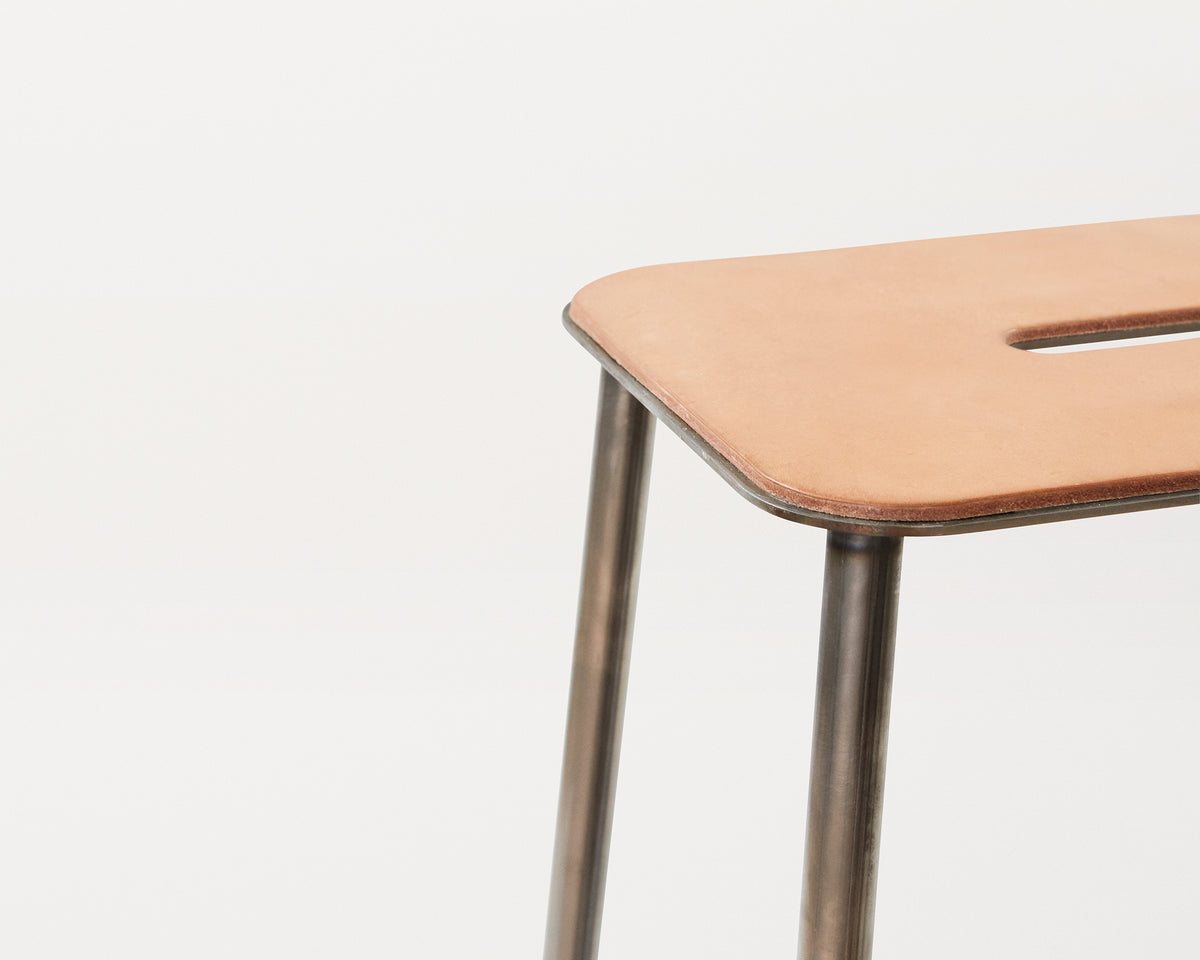 Adam Stool | Raw Steel / Natural Leather | H65 – FRAMA